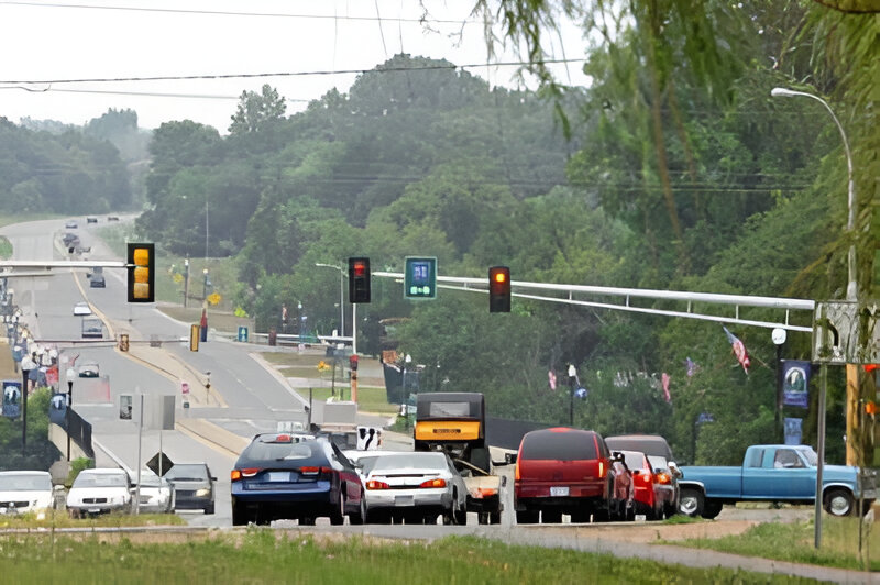 Refining Max-Pressure Traffic Signal Control to Improve Traffic Flow ...